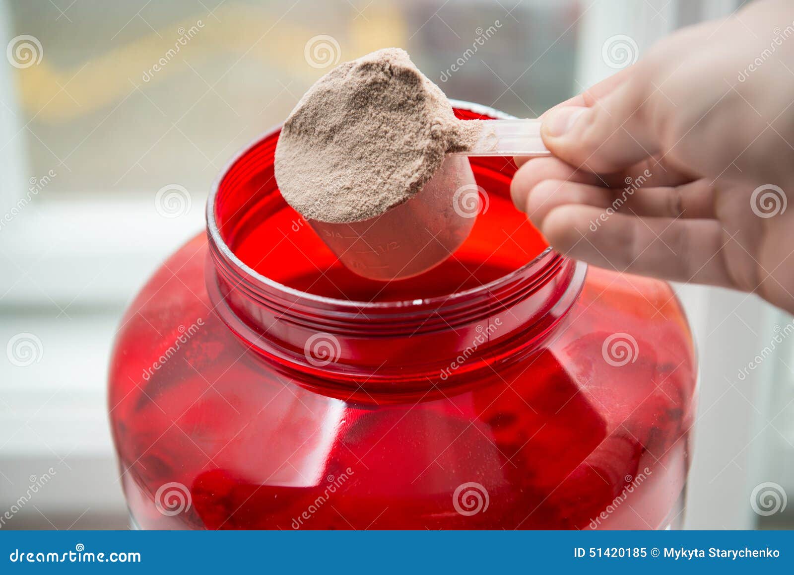 Man Taking Protein from Container by the Scoop. Stock Image - Image of ...