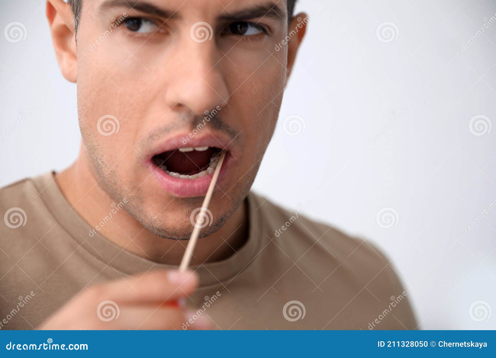 Man Taking Sample for DNA Test on Light Background, Closeup Stock Photo ...