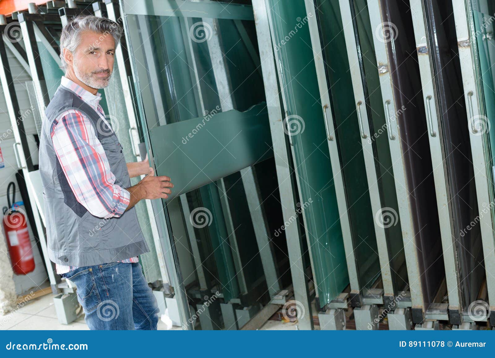 Man Taking Sheet Glass from Racking Stock Photo - Image of warehouse ...