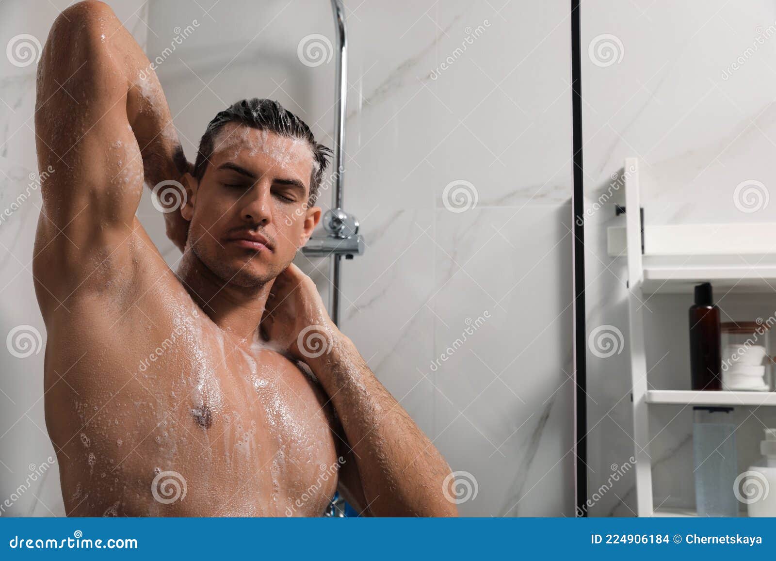 Man taking shower with gel stock photo. Image of adult - 224906184