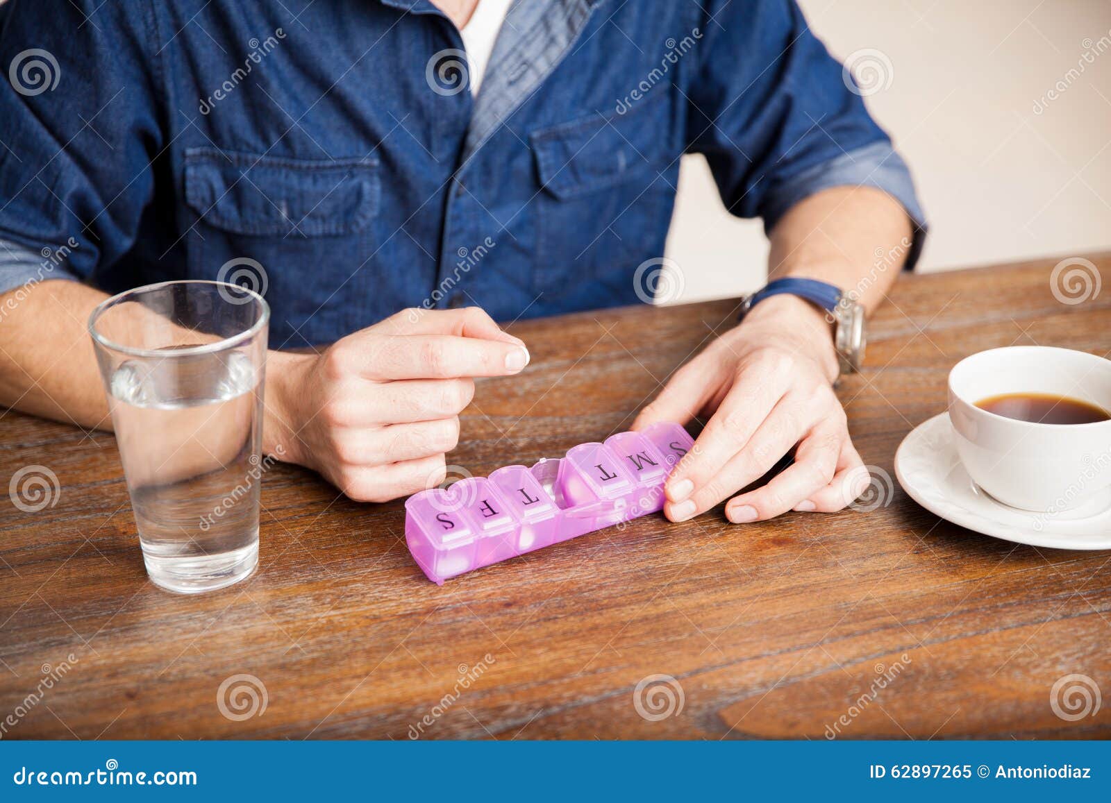 Man Taking Vitamins at Home Stock Image - Image of organizer, close ...