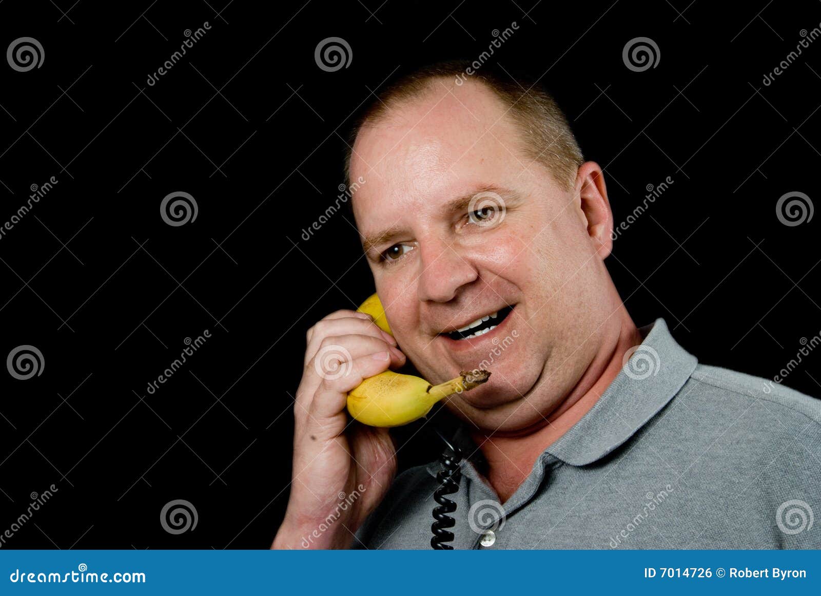 Man Talking on Banana Phone Stock Photo - Image of black, silly: 7014726