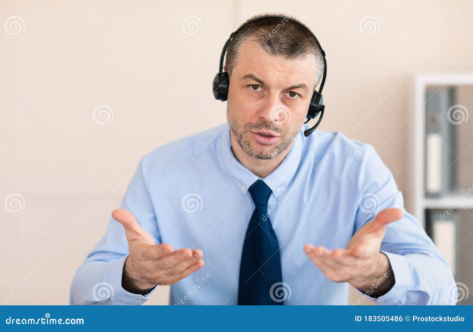Man Talking with Customer Solving Problem Working in Call Center Stock ...