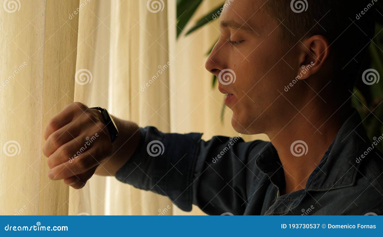 Man Talking on His Smartwatch Stock Image - Image of interior, touch ...