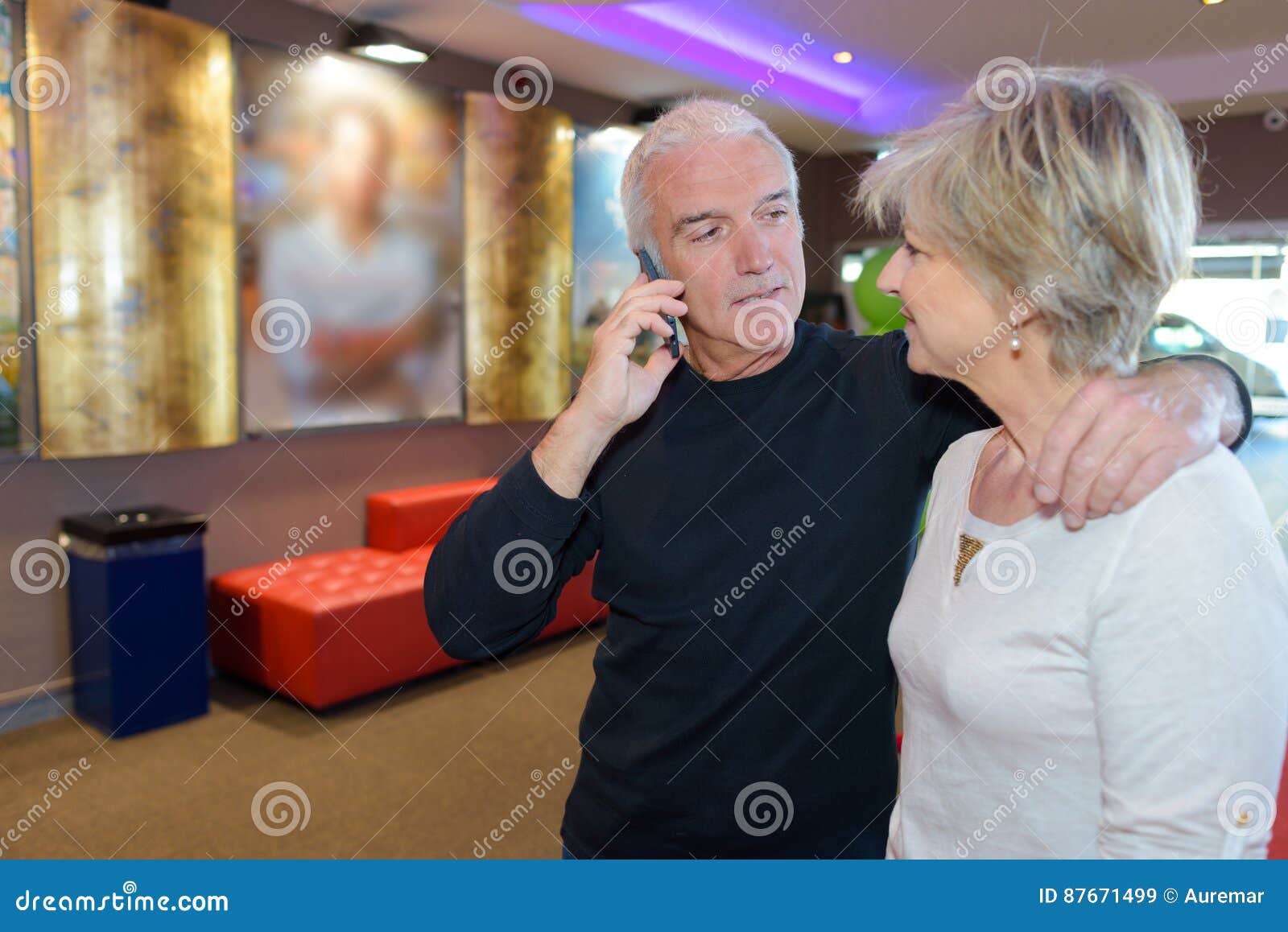 Man talking inside cinema stock image. Image of cellular - 87671499