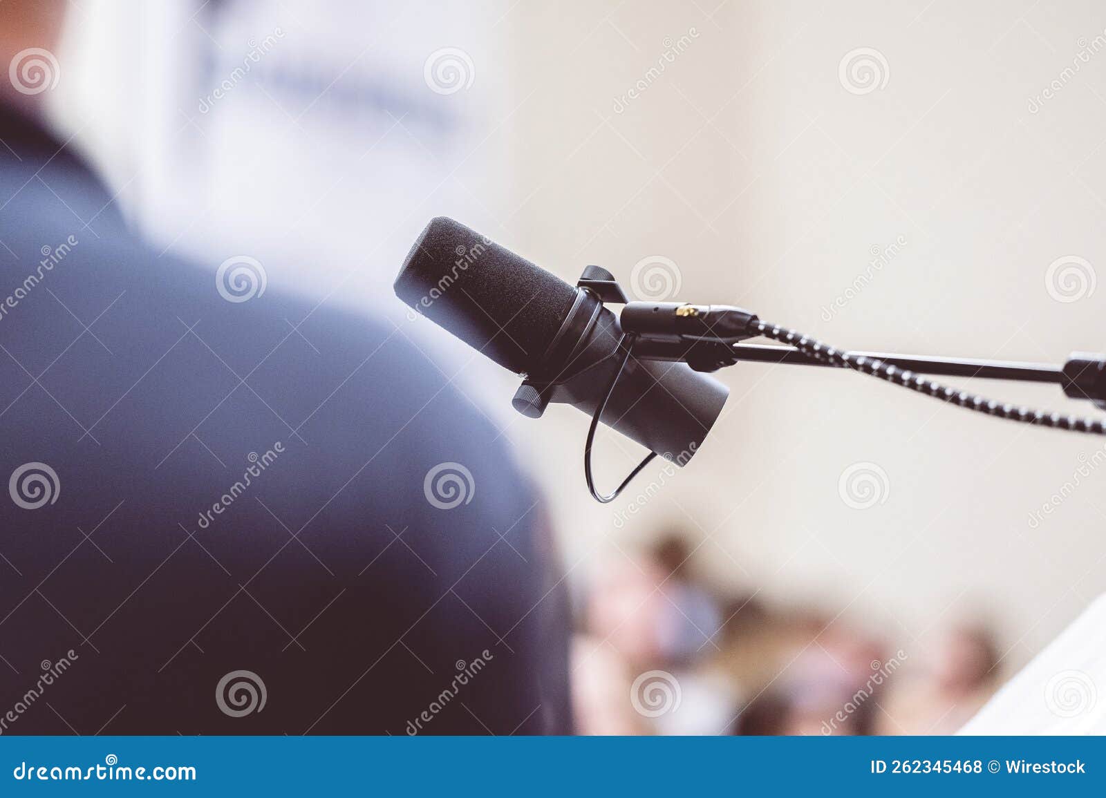 Man Talking on the Microphone on Stage - Public Speech Stock Photo ...