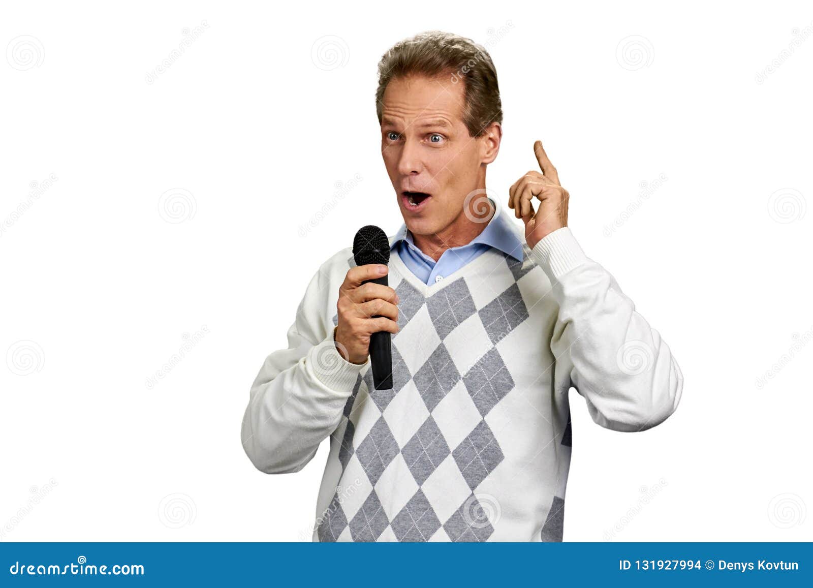 Man Talking into Microphone on White Background. Stock Photo - Image of ...