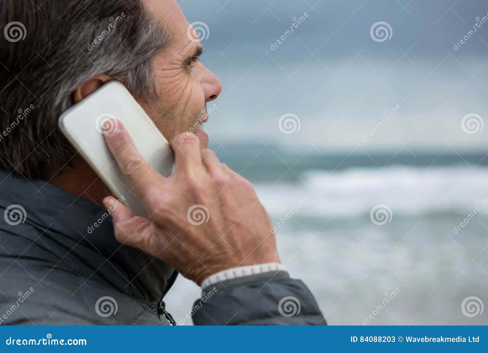 Man Talking on Mobile Phone on Beach Stock Image - Image of phone ...