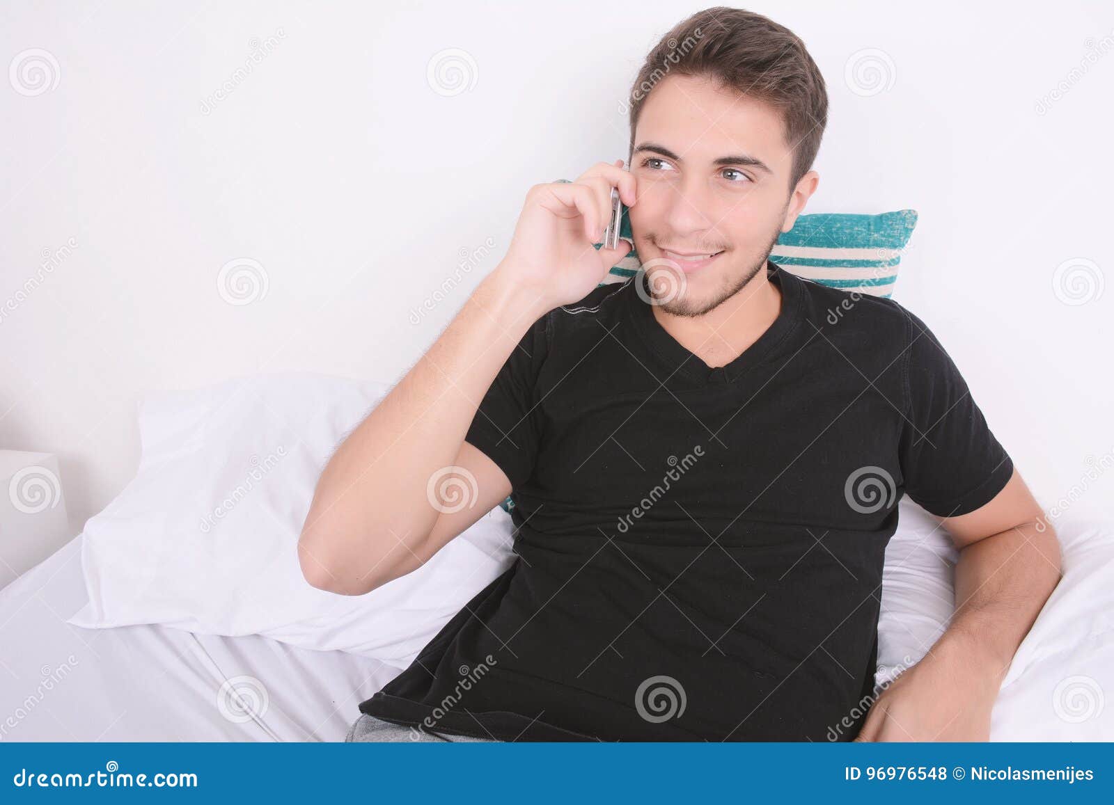 Man Talking on Phone in Bed. Stock Photo - Image of communication ...