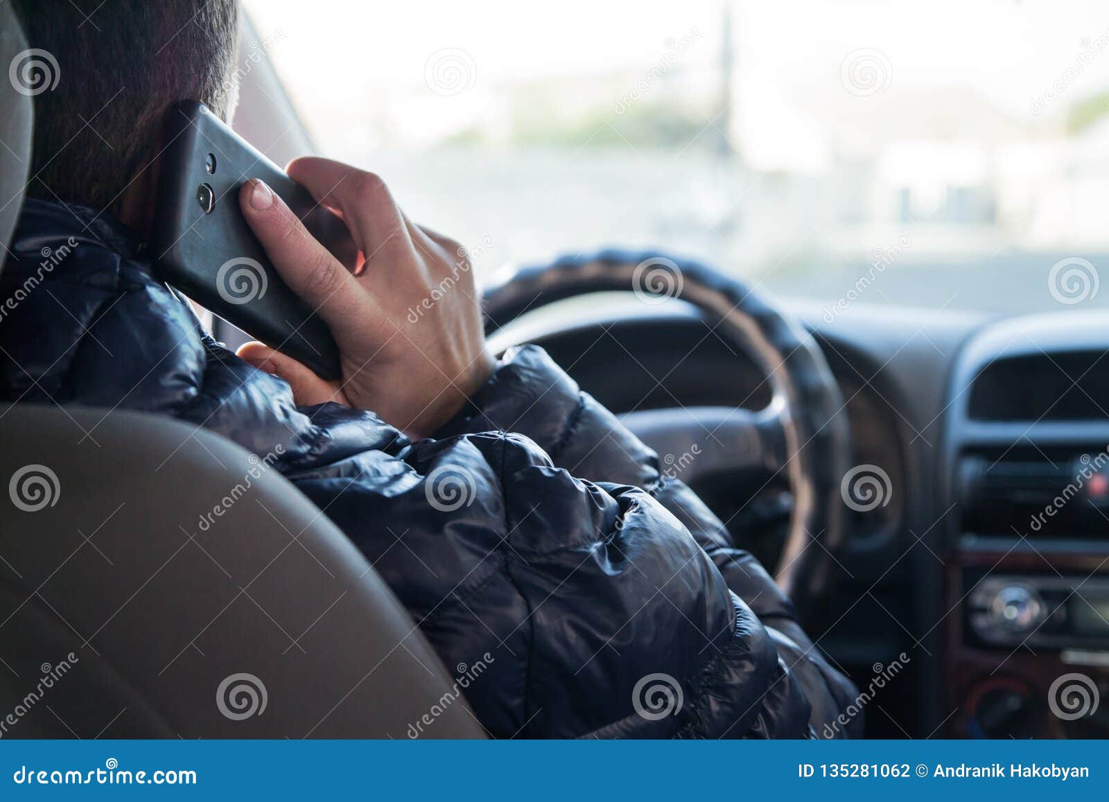 Man Talking on a Phone while Driving a Car. Stock Photo - Image of ...