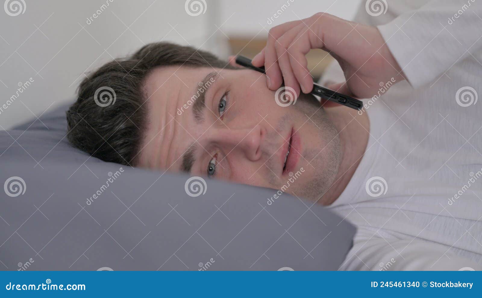 Man Talking on Phone while Sleeping in Bed, Close Up Stock Photo ...