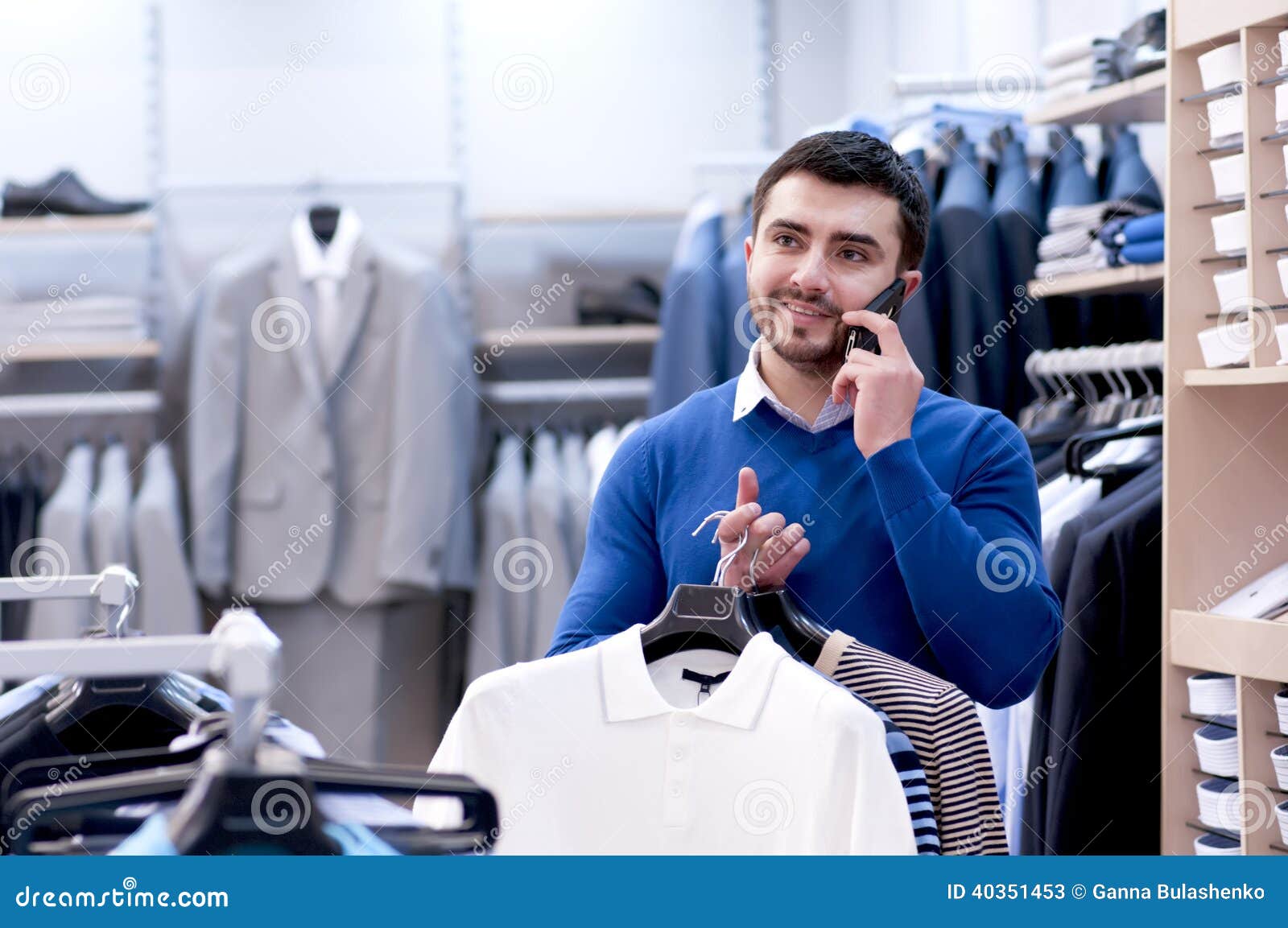 Man Talking on the Phone in the Store. Stock Image - Image of blue ...