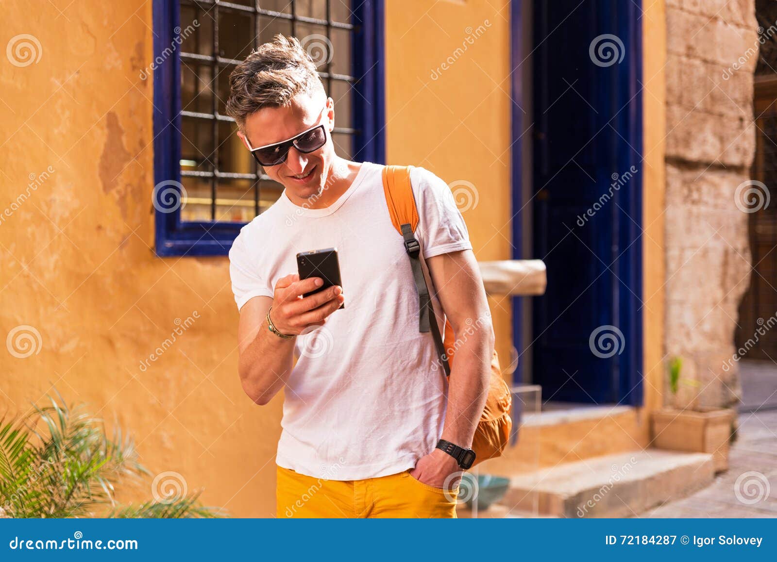 A Man Talking on the Phone on Vacation Stock Image - Image of camera ...