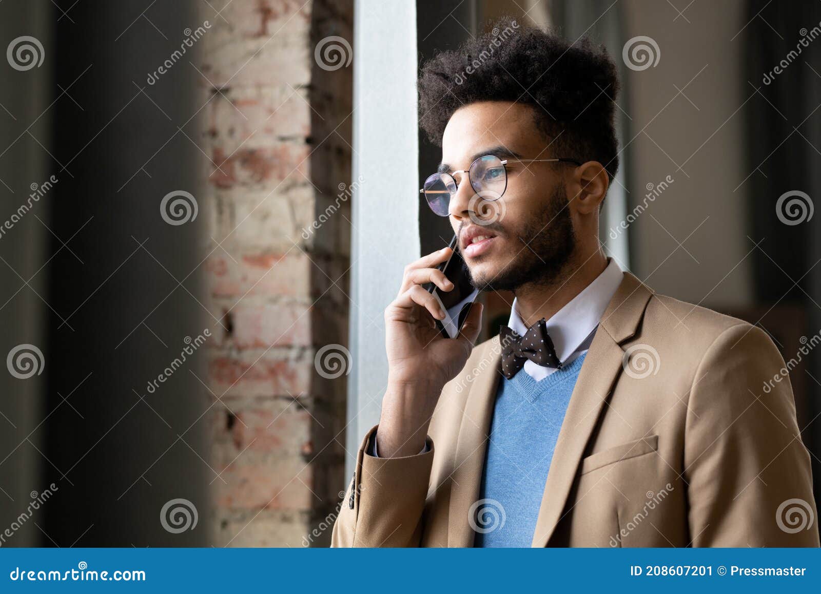 Man talking on the phone stock image. Image of office - 208607201