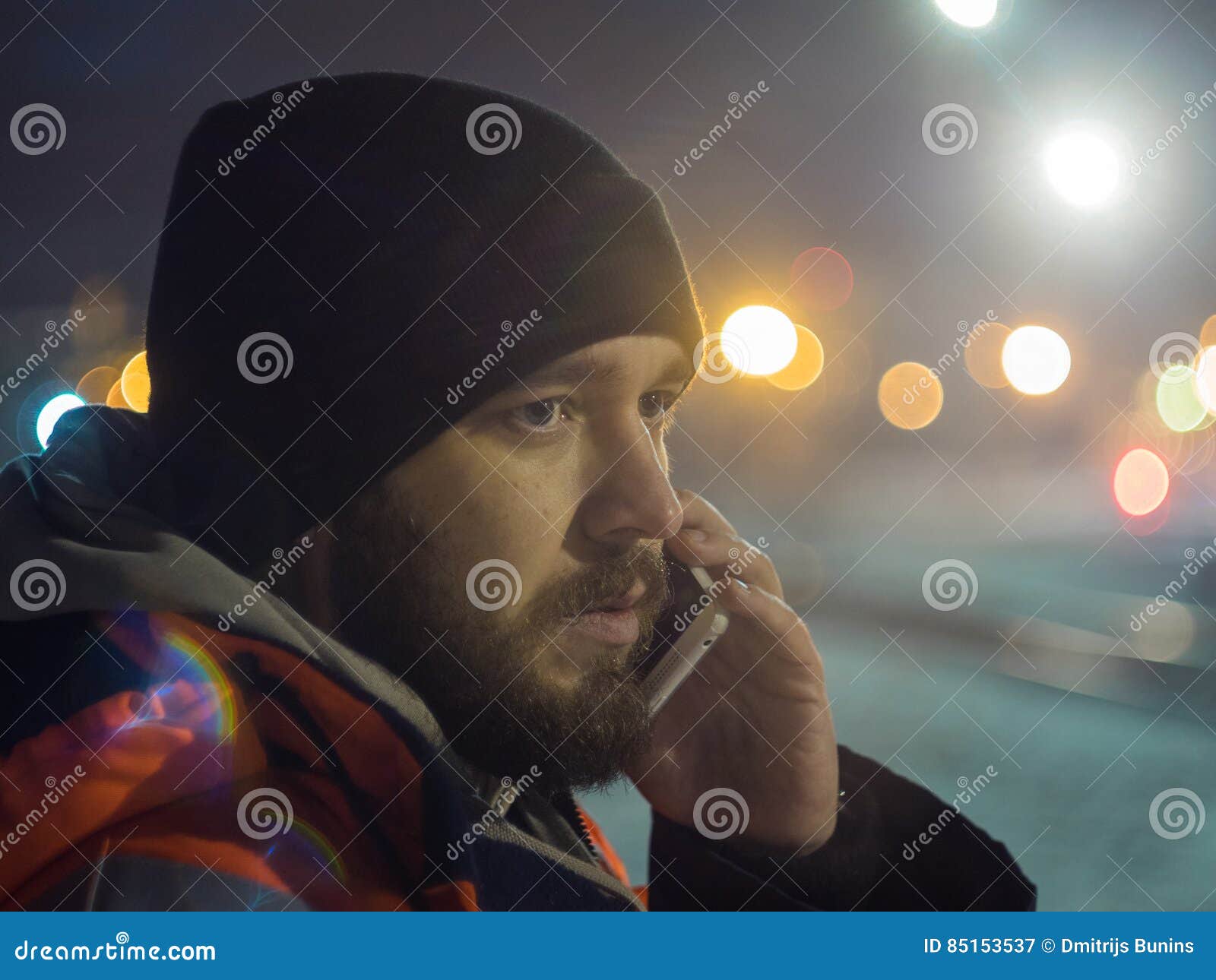 Man Talking by Smartphone at Night Bokeh Light in Background. Concept ...