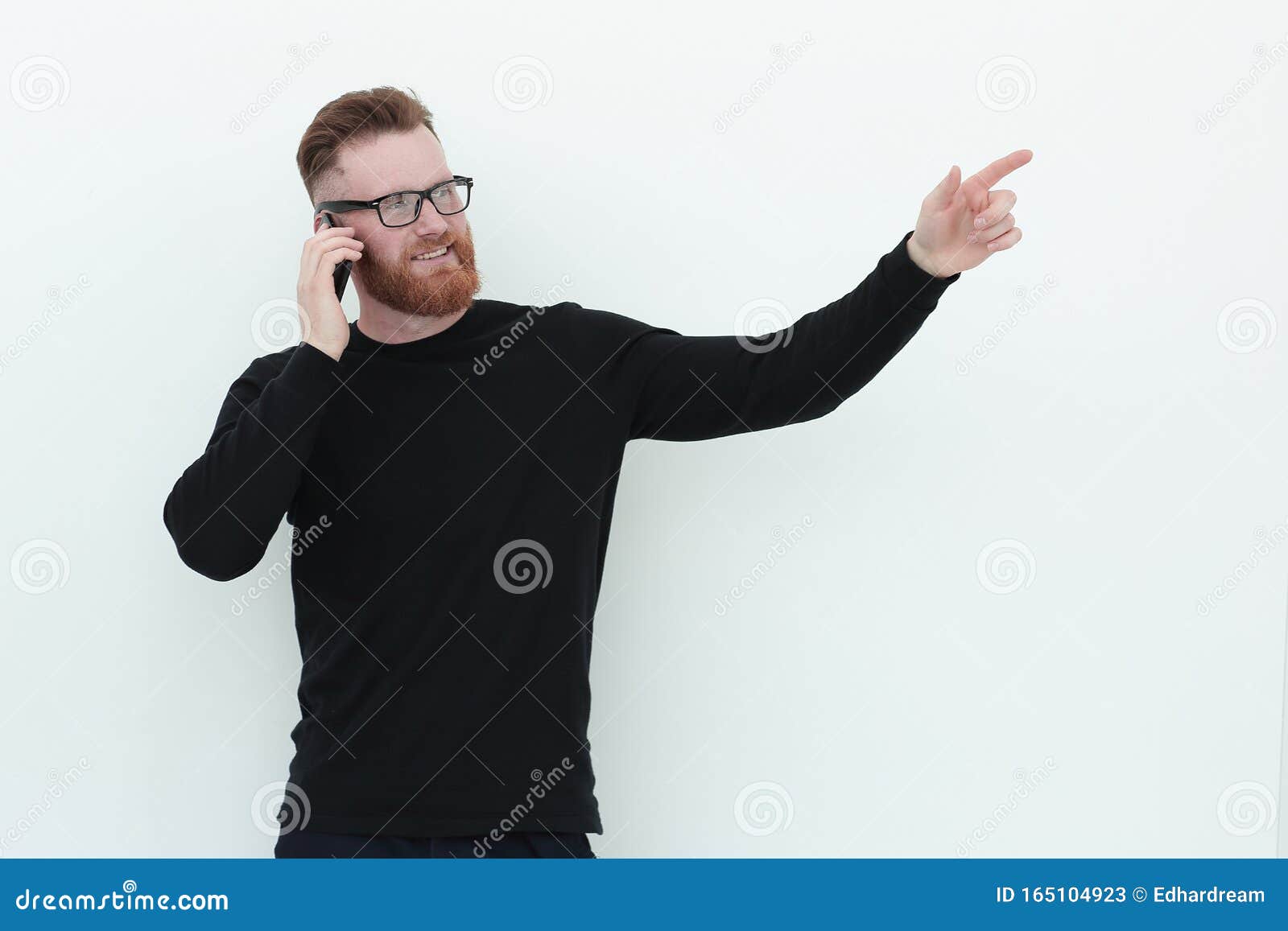 Man Talking on a Smartphone and Points To the Blank Screen Stock Image ...