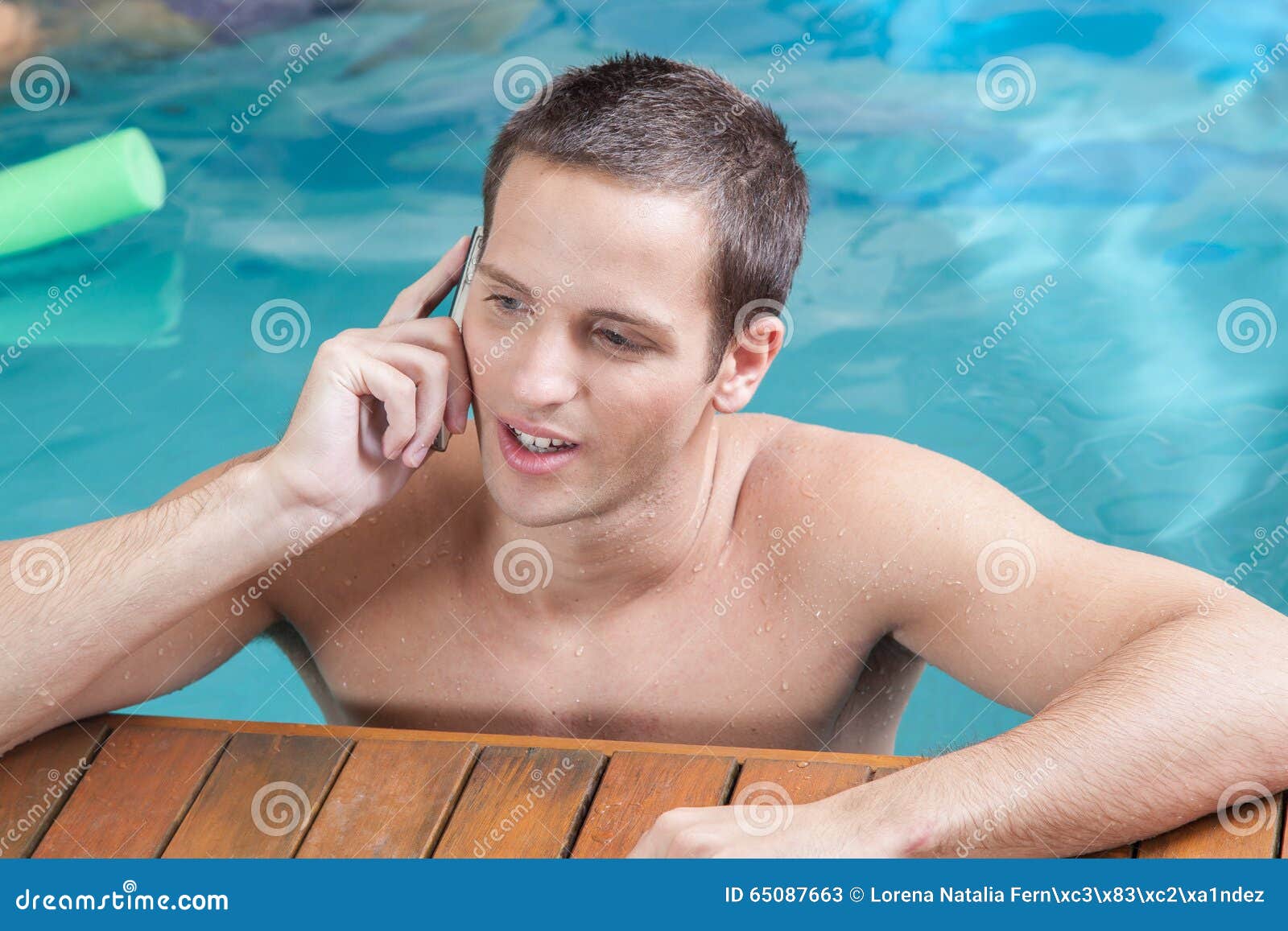 Man Talking on Telephone in the Edge of the Pool Stock Image - Image of ...
