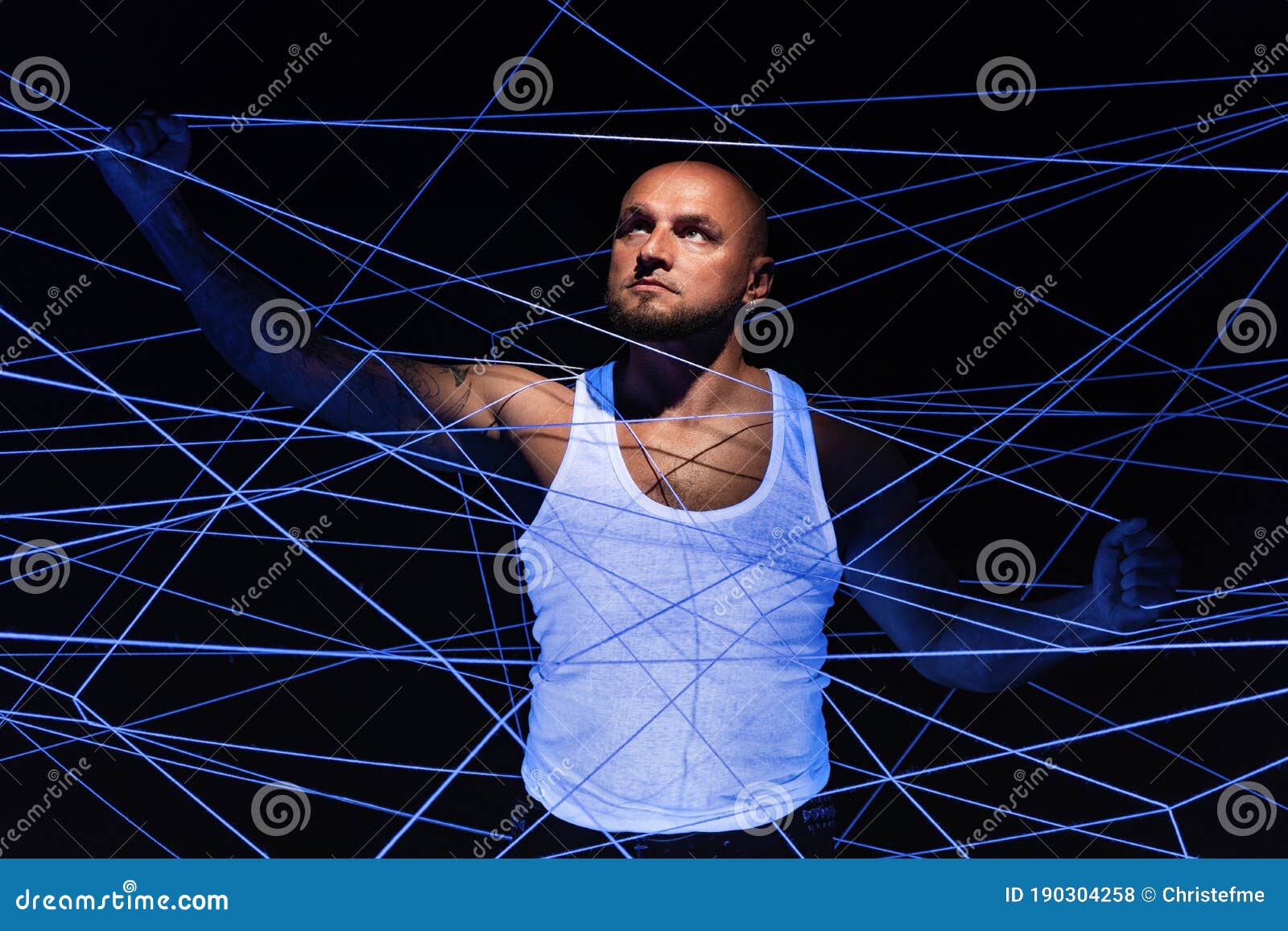 Man Tangled in White Threads with Hands Up Stock Photo - Image of ...