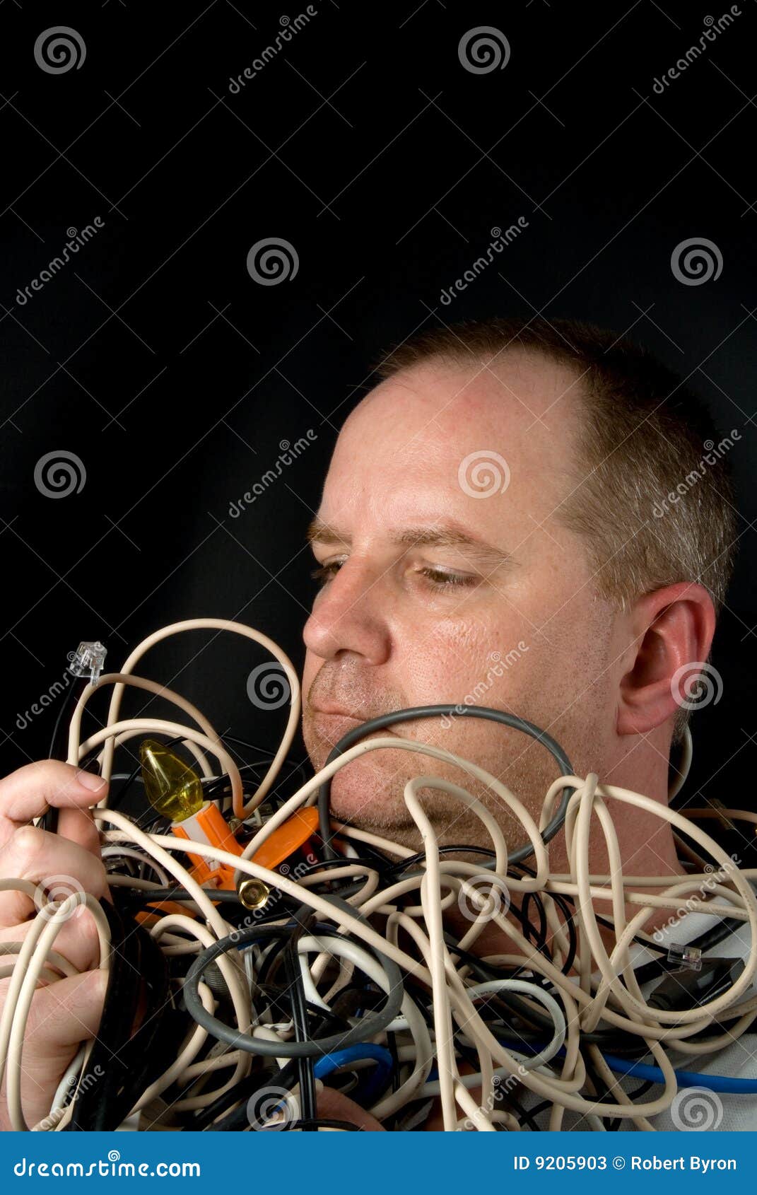 Man Tangled in Wires stock image. Image of people, chaos - 9205903