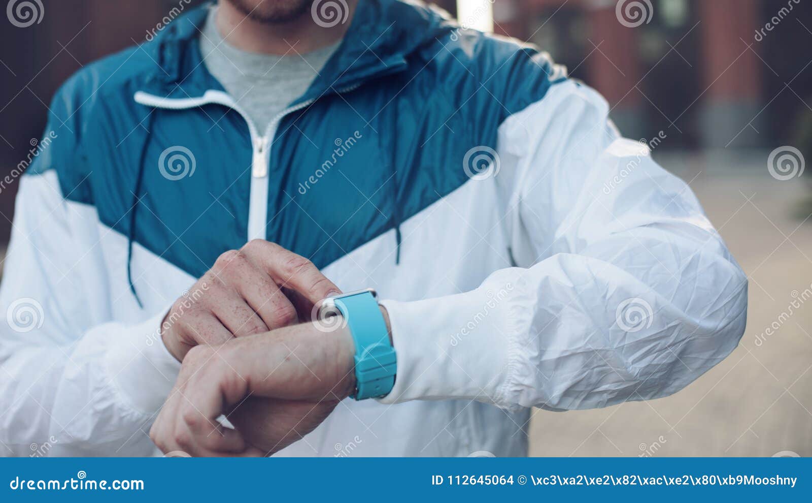 Man Tapping the Screen of Smart Watches Stock Photo - Image of ...
