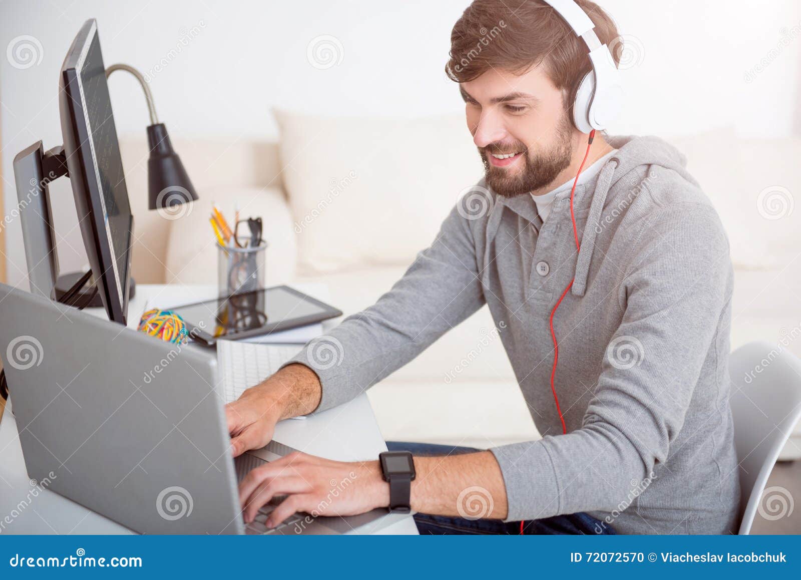 Man Tapping and Using Headset Stock Photo - Image of person, keyboard ...