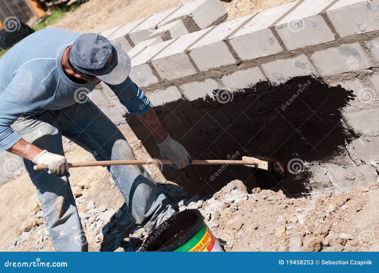 Man Tarring a House Foundation Stock Image - Image of tarring, outdoors ...