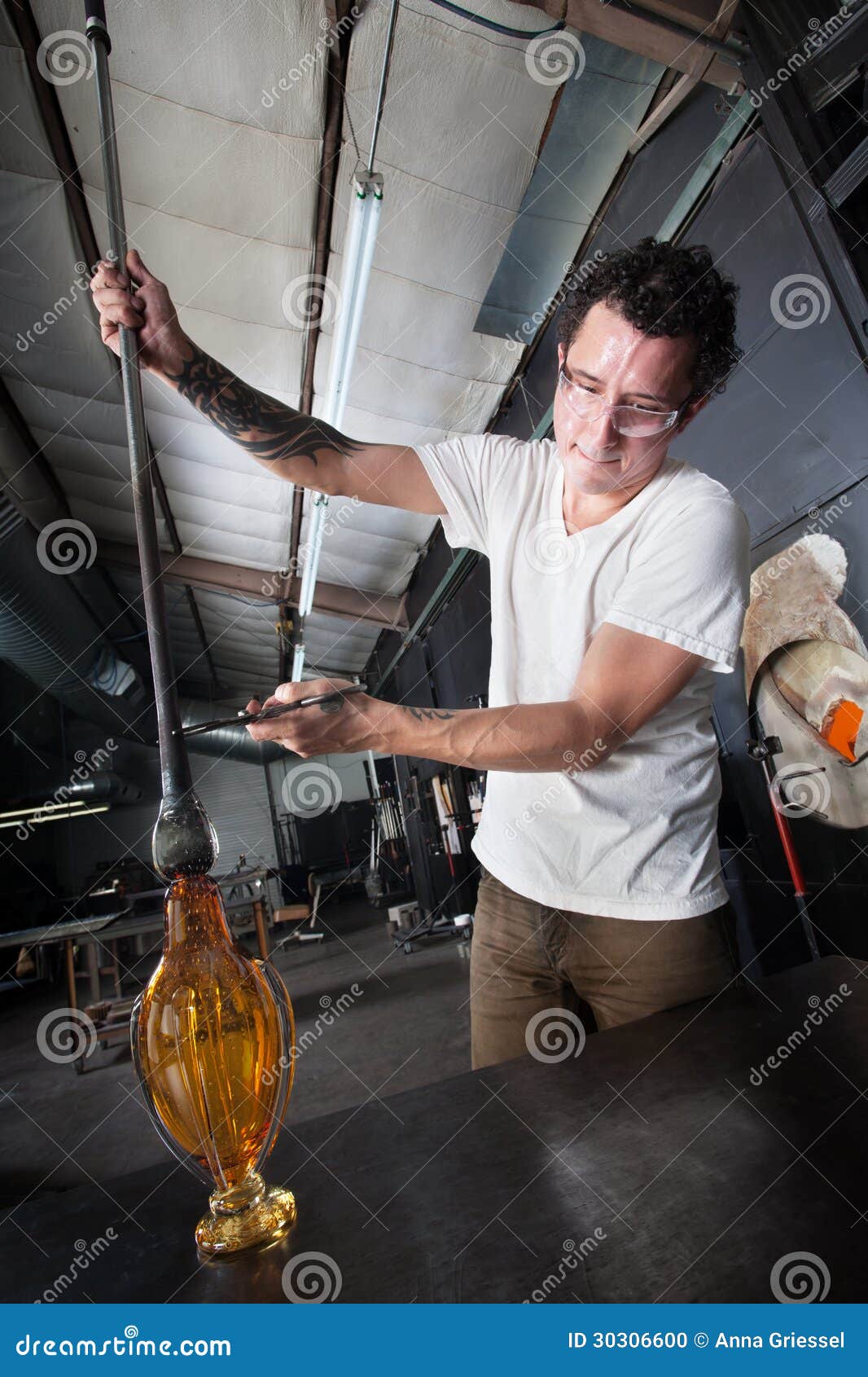 Man Creating Glass Object stock photo. Image of blast - 30306600