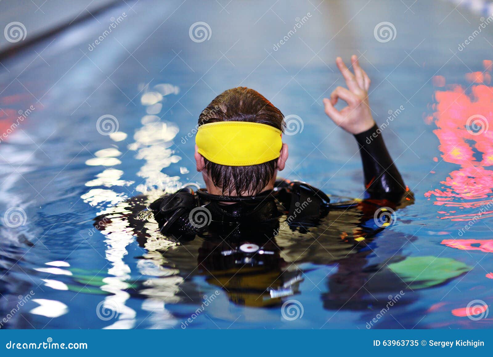 Man teaches diving in pool stock image. Image of divers - 63963735