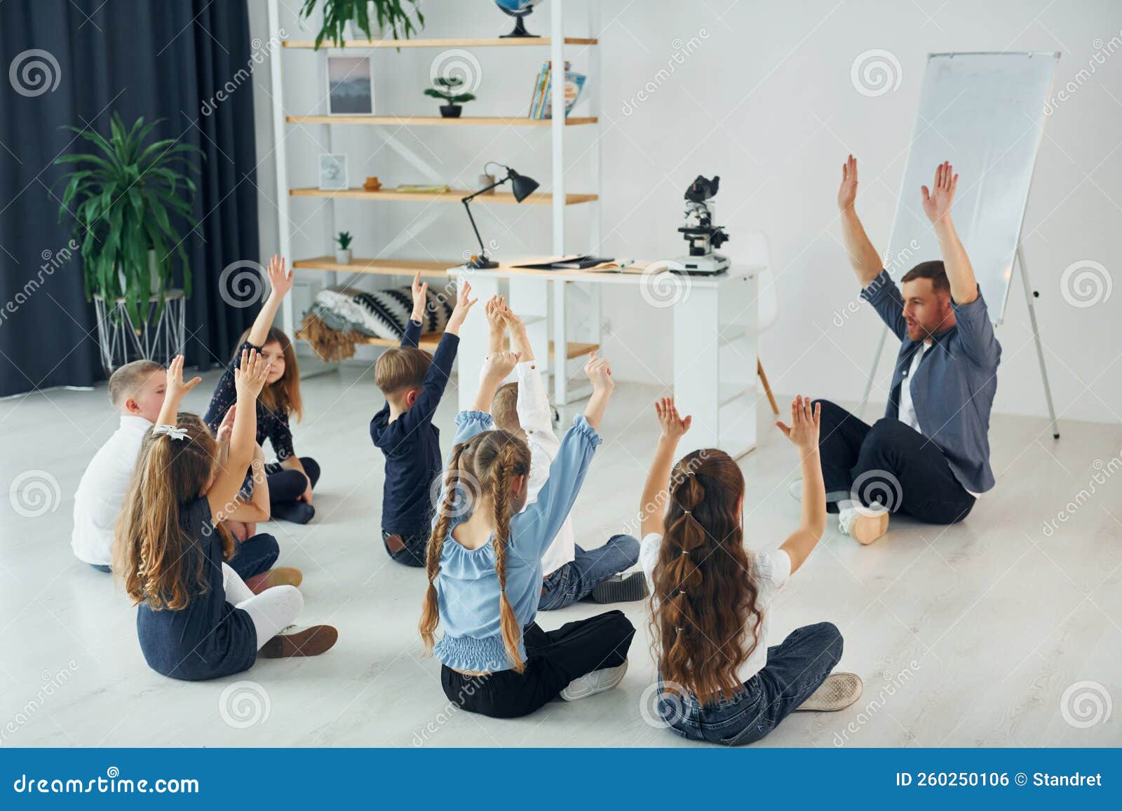 Man Teaches Gesture Language. Group of Children Students in Class at ...