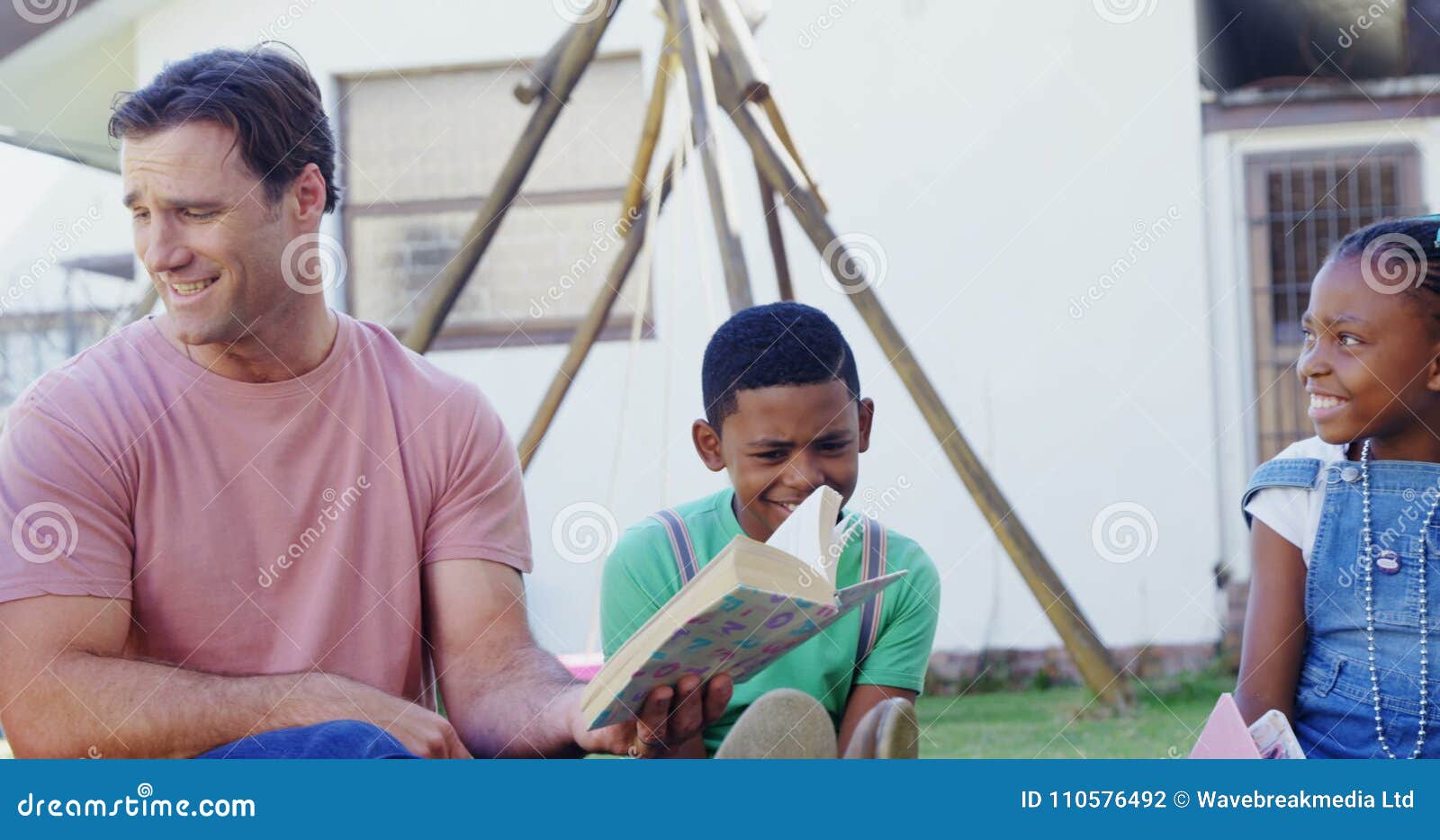 Man Teaching Kids in the Backyard of House 4k Stock Footage - Video of ...