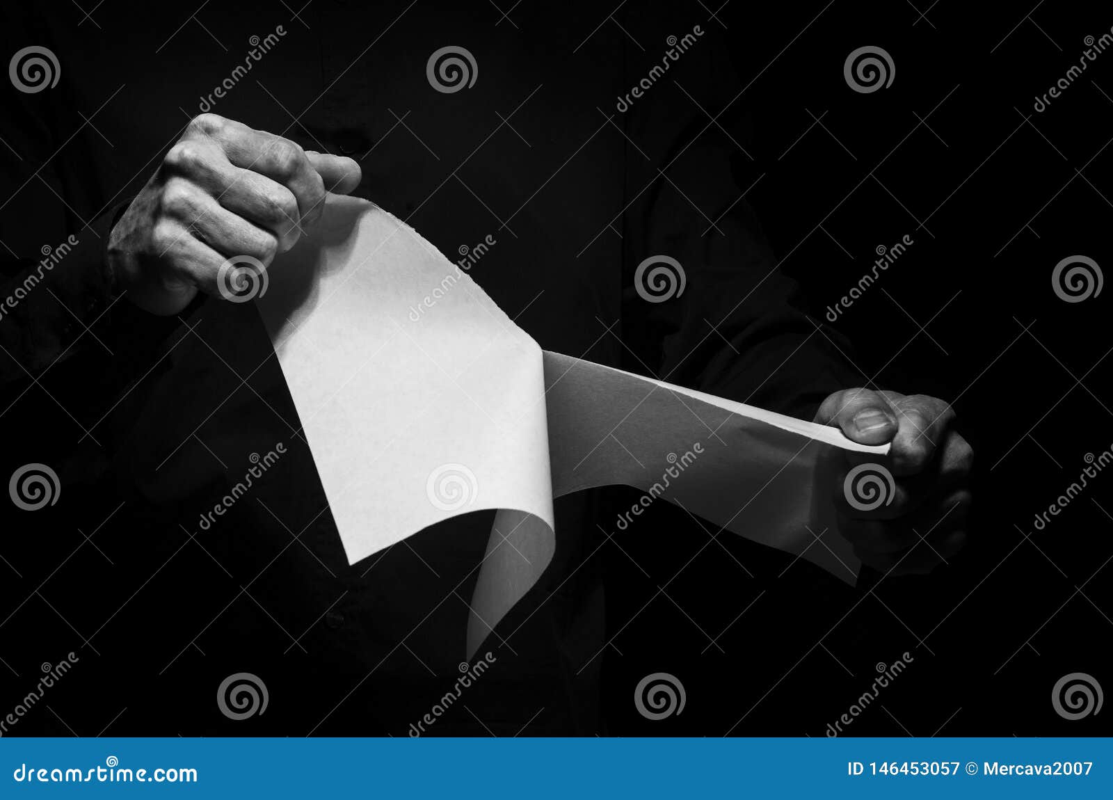 Man Tearing a Piece of Paper Stock Image - Image of work, white: 146453057