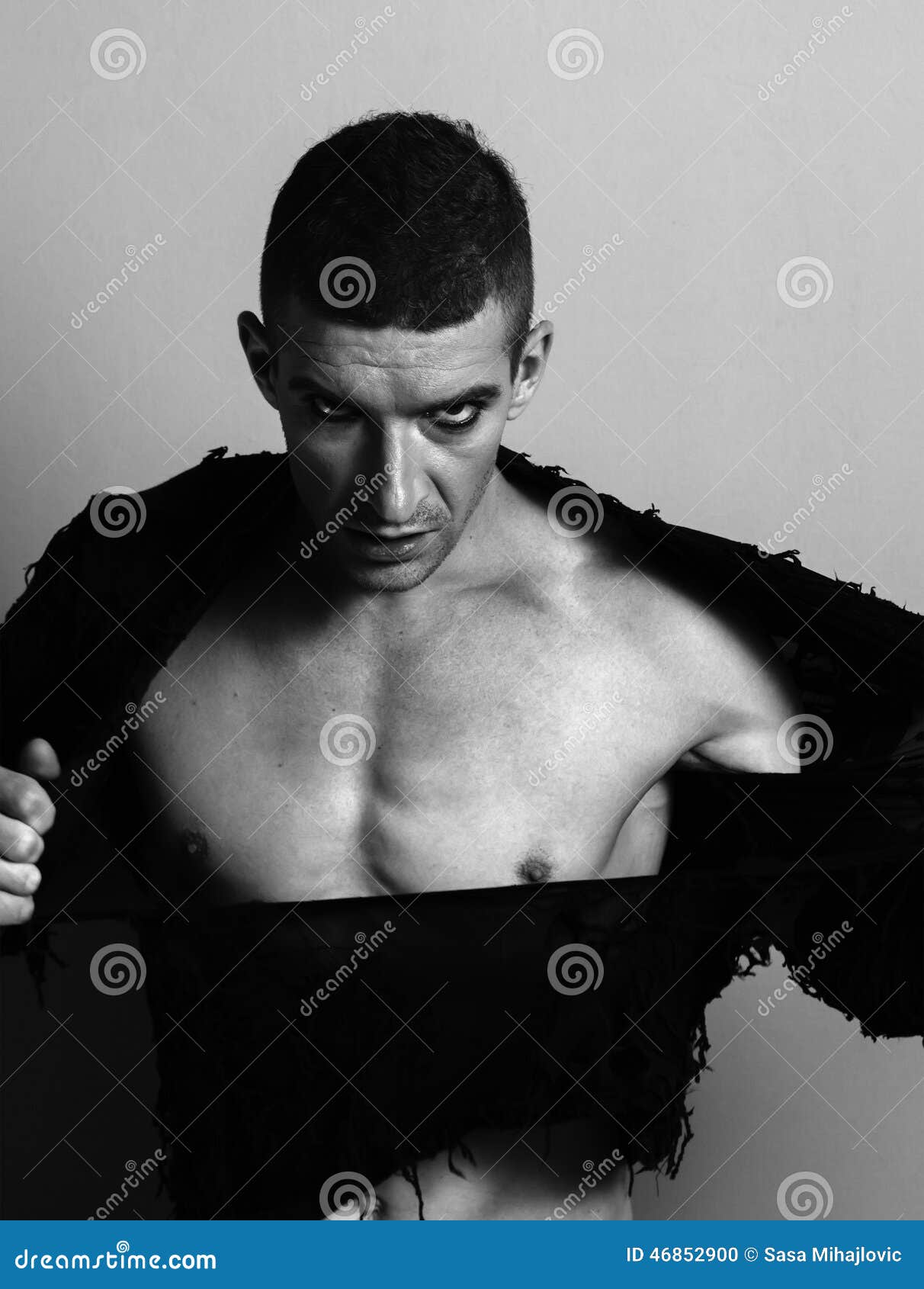Man tearing shirt stock photo. Image of portrait, serious - 46852900