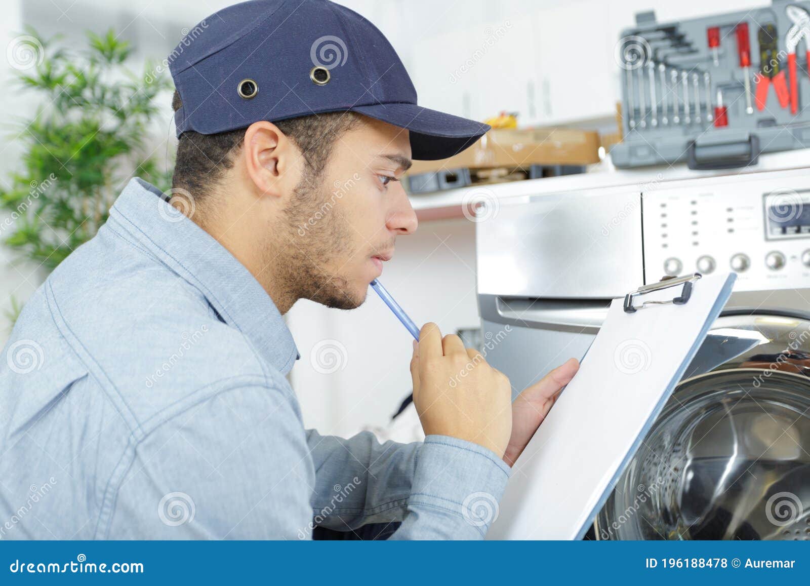 Man Technician Servicing Washing Machine Stock Photo - Image of ...