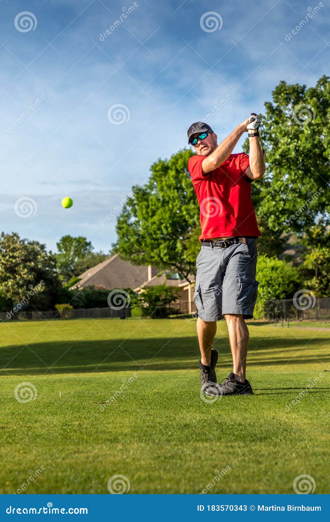 Man Teeing Off in the Tee Box, Playing Golf Stock Image - Image of ...