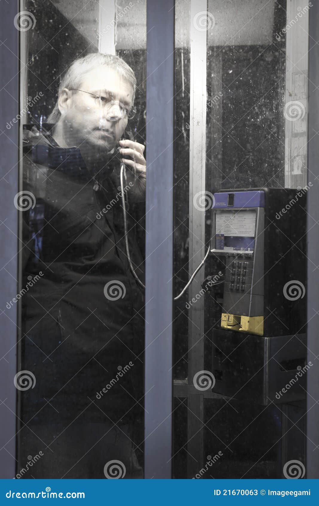 Man in a Telephone Booth at Night Stock Image - Image of difficulties ...
