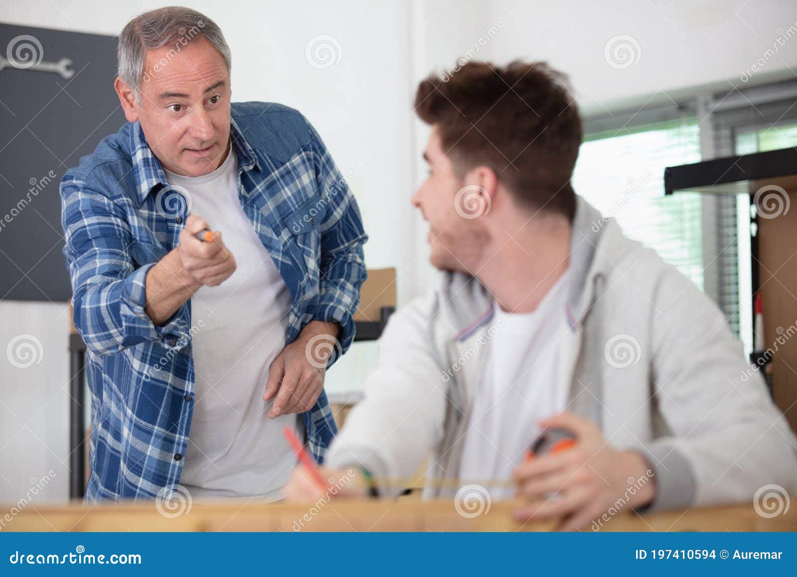 Man telling off student stock photo. Image of carpenter - 197410594