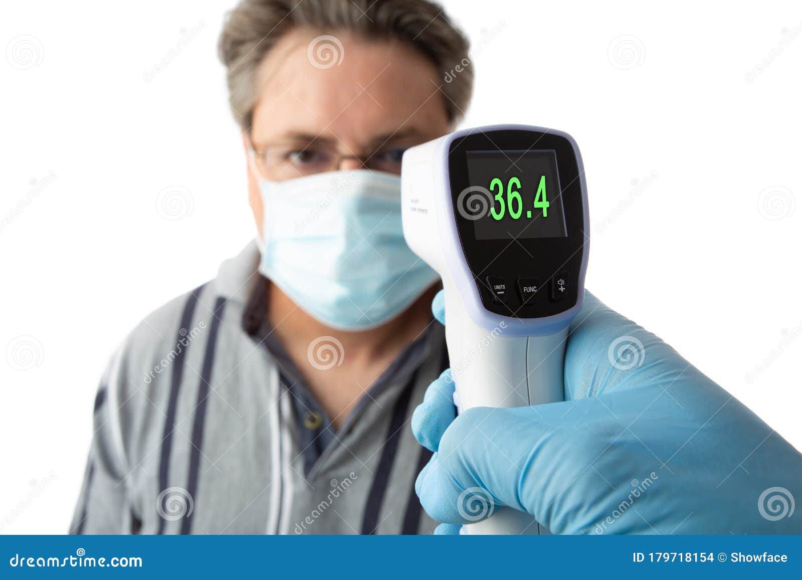 A Man is Temperature Checked for Fever or High Temperature Stock Photo ...