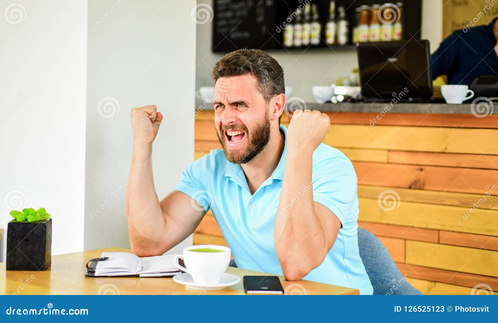 Man Tense Aggressive Expression Face Sit Cafe with Mug of Coffee and ...