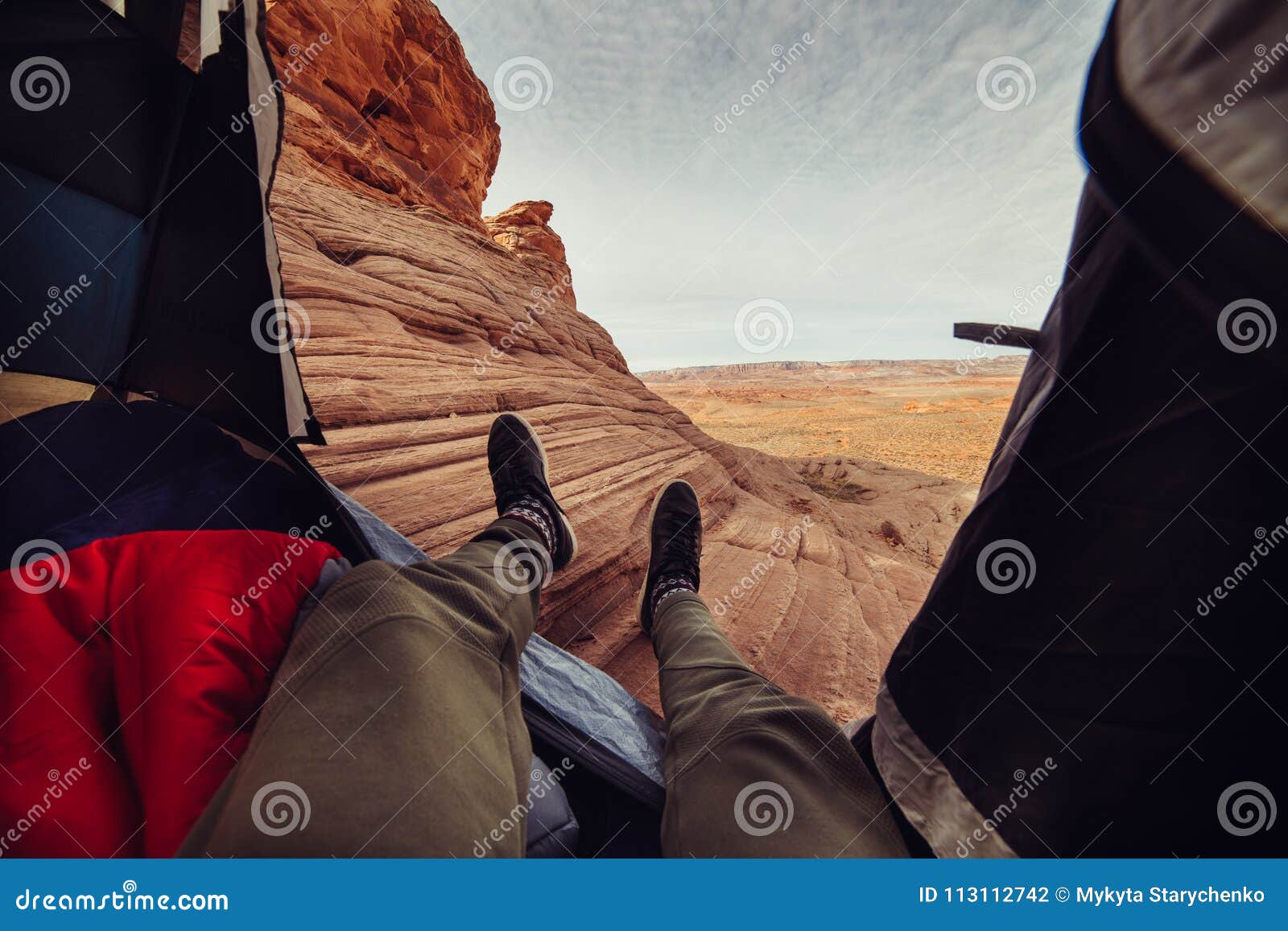 Man in the Tent Camping on the Mountains with Scenic View from Inside ...