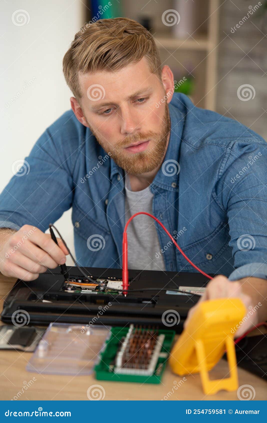 Man Testing Broken Laptop with Multimeter Stock Image - Image of ...