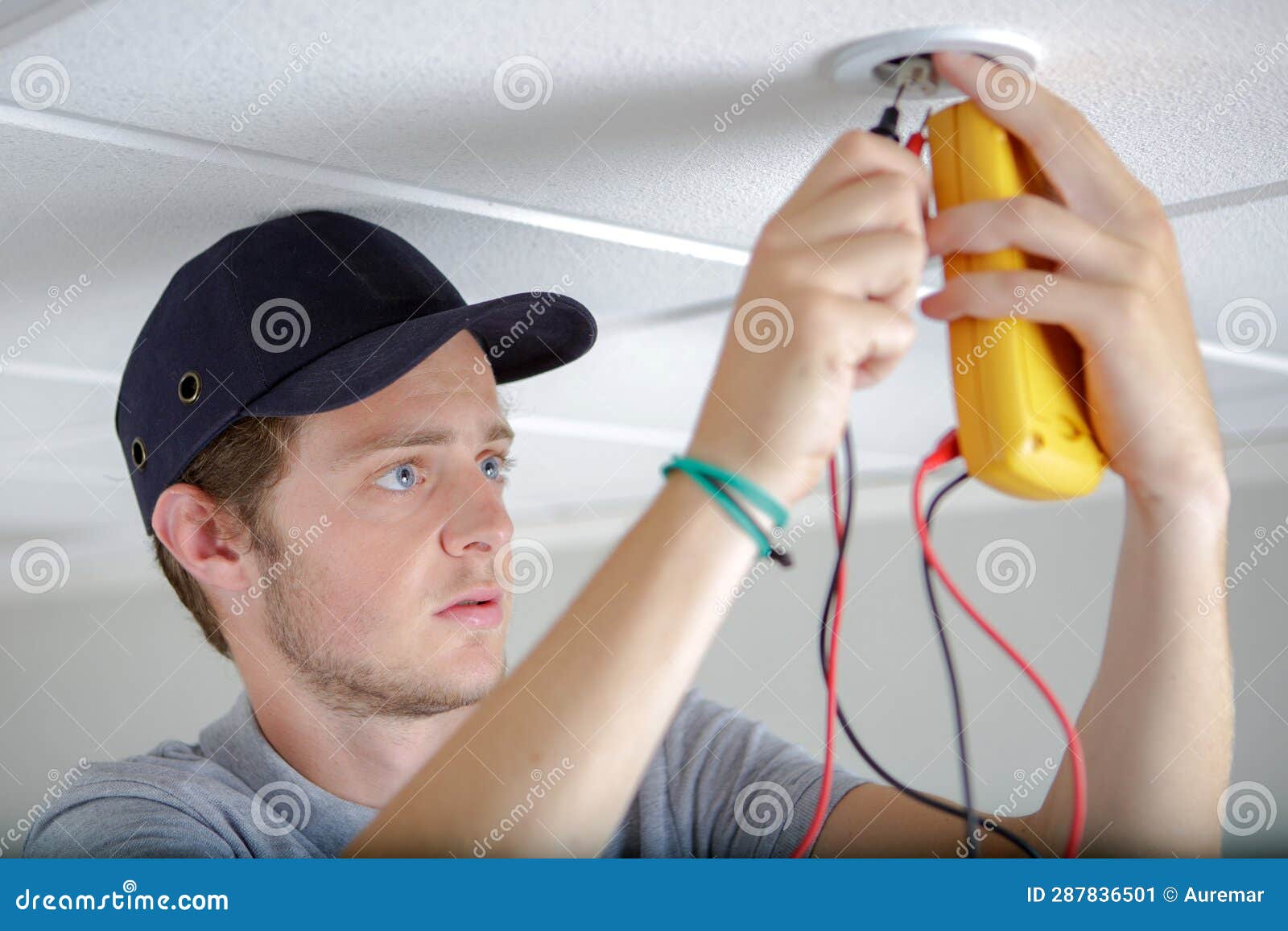 Man Testing Bulb Holder with Multimeter Stock Image - Image of laborer ...