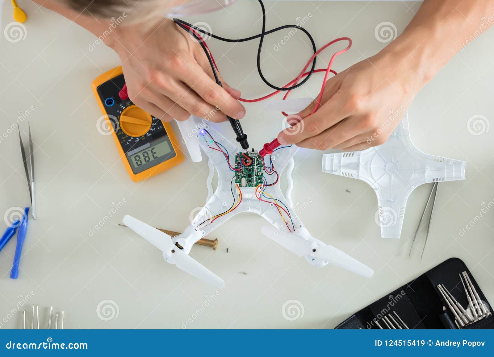 Man Testing Electric Current of Drone Using Multimeter Tool Stock Image ...
