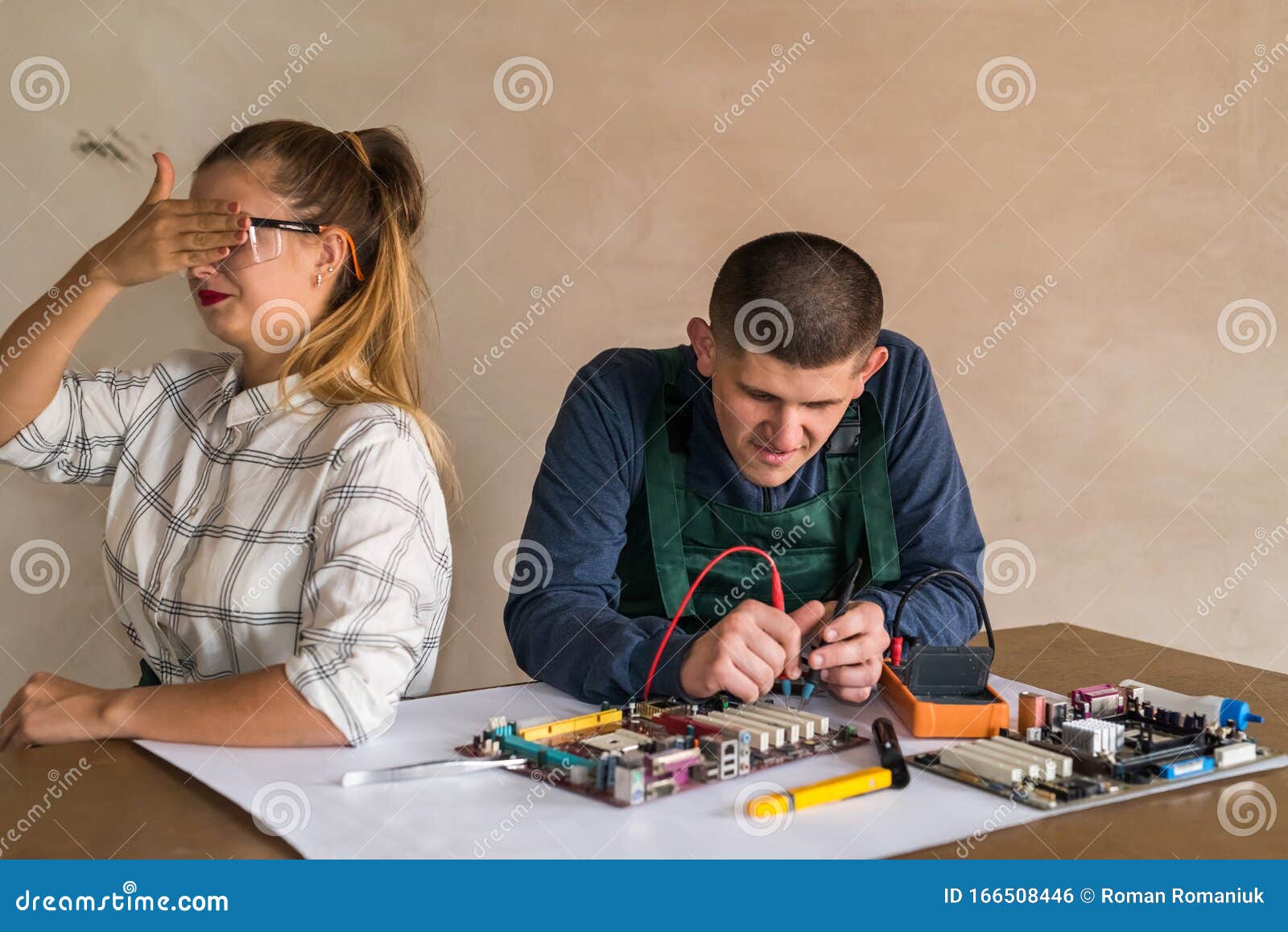 Man Testing Motherboard of Personal Computer by Multimeter Stock Photo ...
