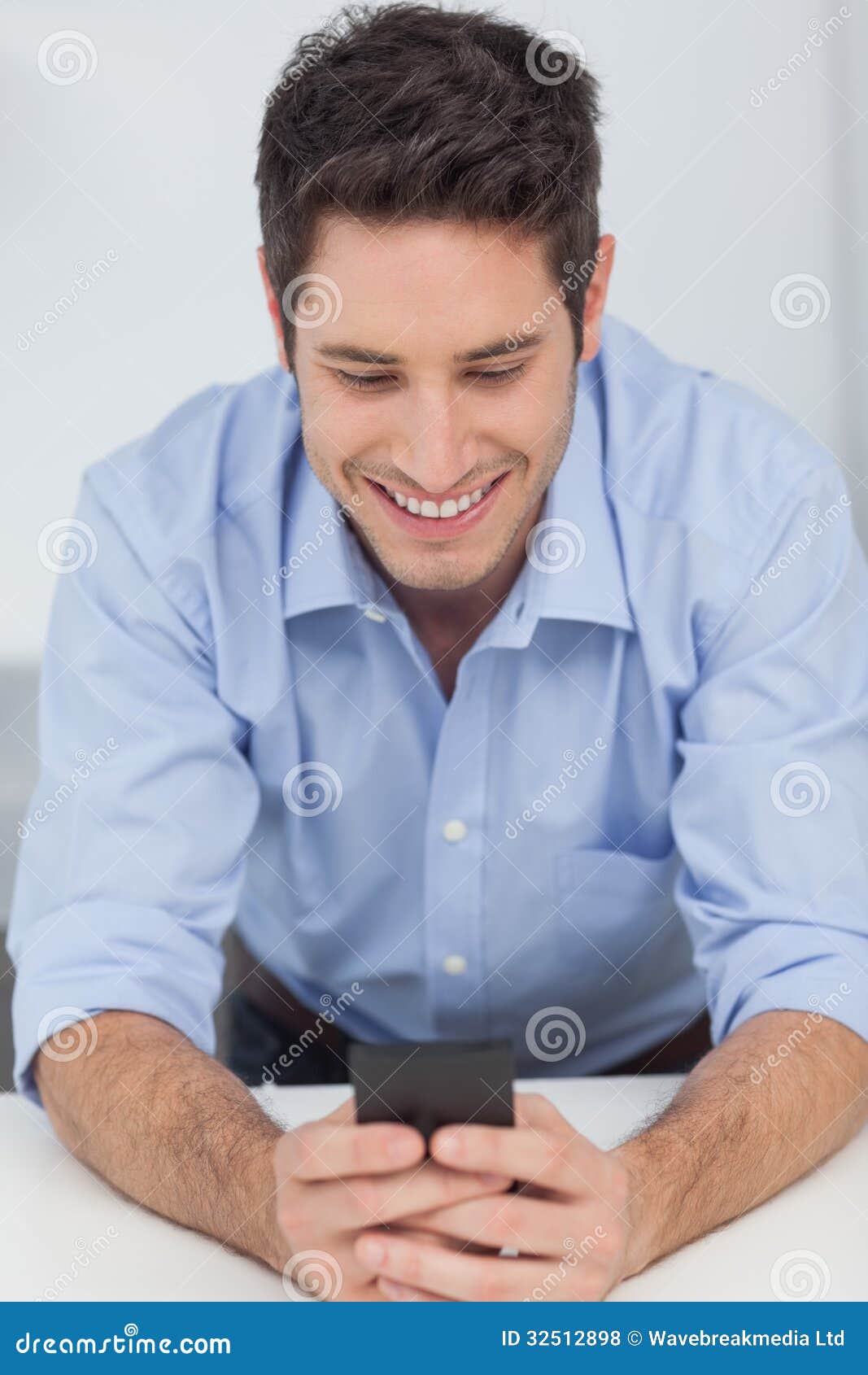 Man Text Messaging with His Smartphone Stock Photo - Image of handsome ...