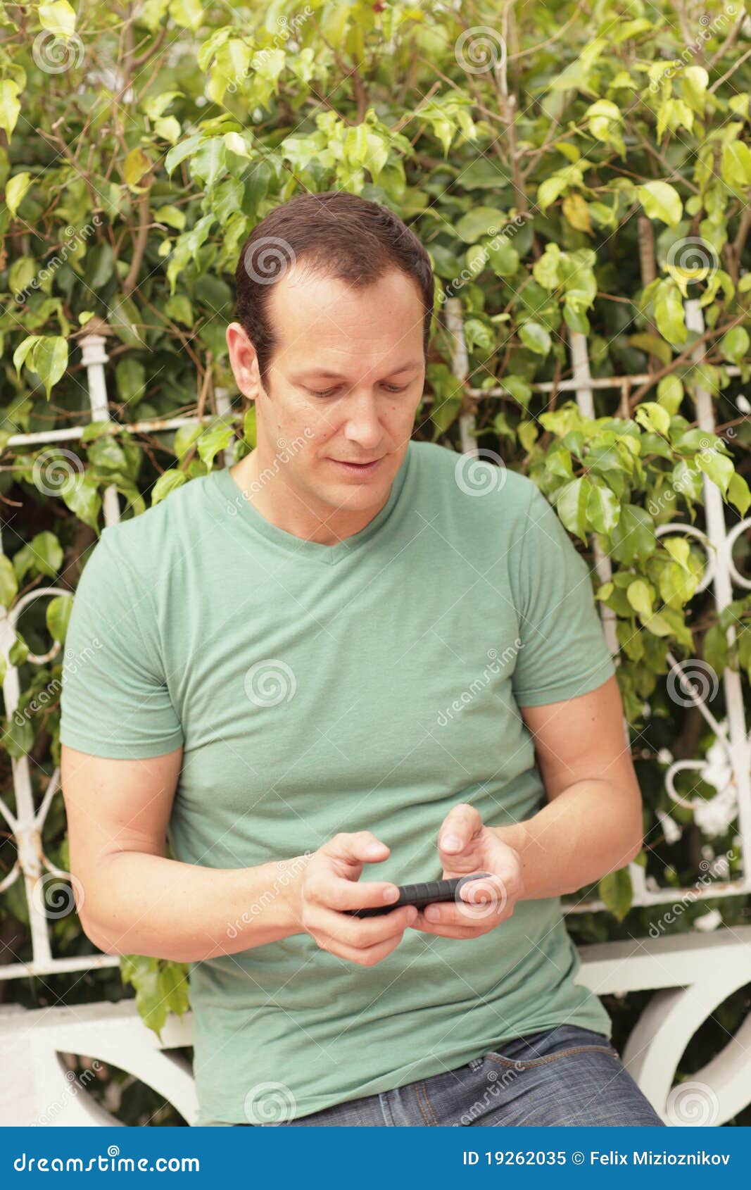 Man texting stock image. Image of phone, text, green - 19262035