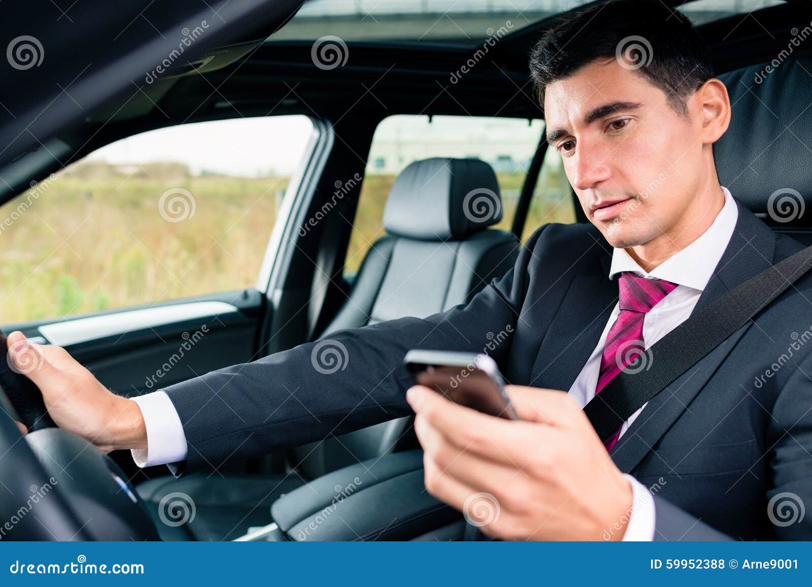 Man Texting while Driving by Car Stock Photo - Image of businessperson ...