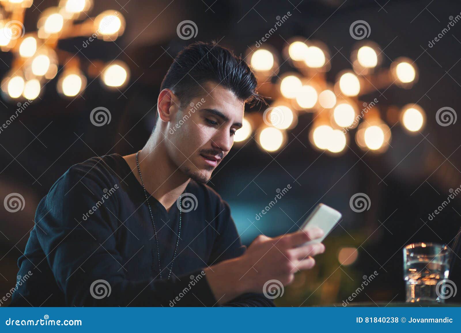 Man Texting with His Mobile Phone at the Bar Stock Photo - Image of ...