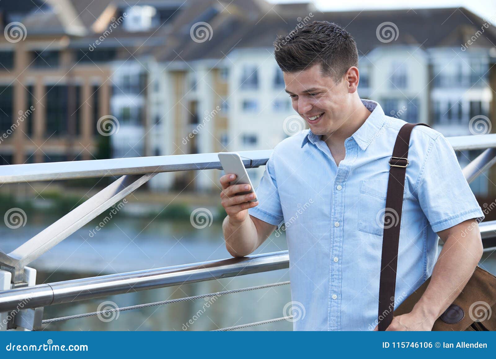Man Texting on Mobile Phone on Way To Work Stock Photo - Image of male ...