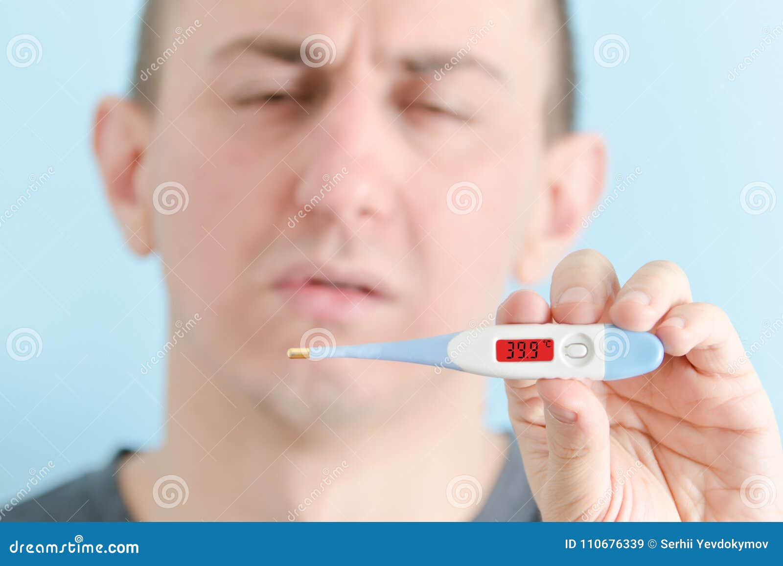 Man with a Thermometer in His Hand. Increased Body Temperature Stock ...