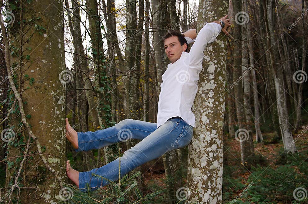 Man Thinking and Relaxing on Tree Stock Photo - Image of copy, facial ...